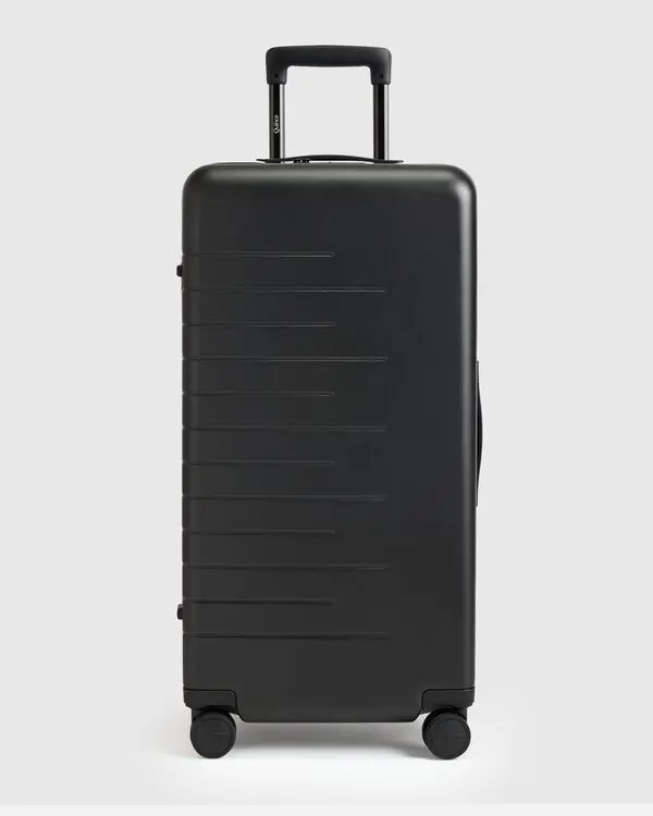 Quince Trunk Check-in Suitcase - Black