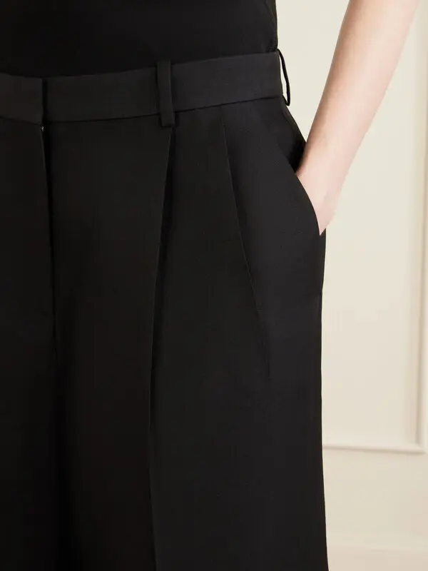 Khaite Pleated Wool And Silk-blend Cady Shorts