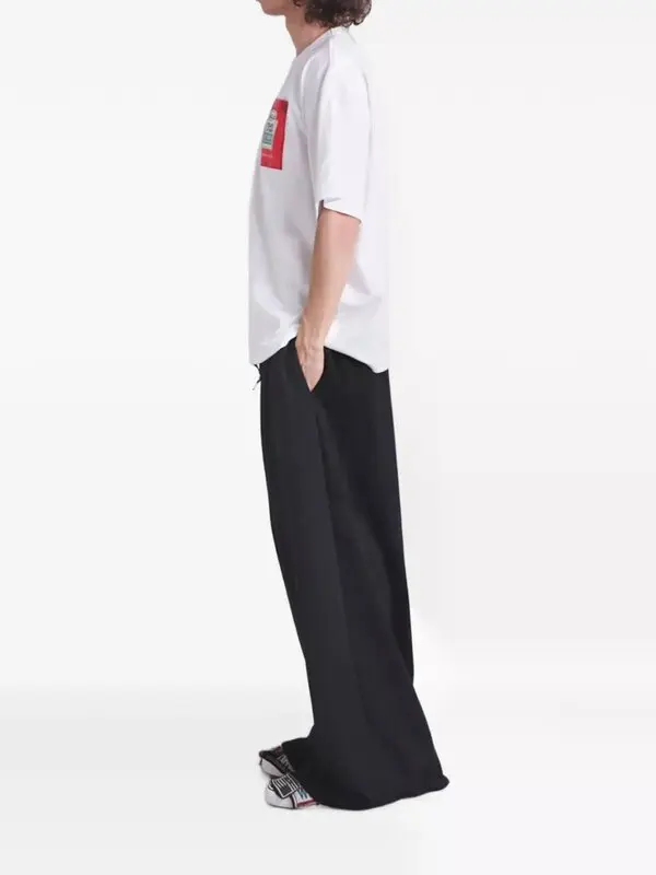 YOSHIOKUBO Pleated Wide-leg Trousers