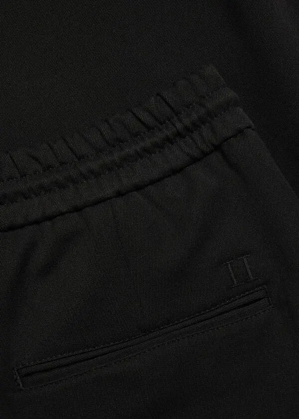 LES DEUX Tapered-leg Trousers - Black