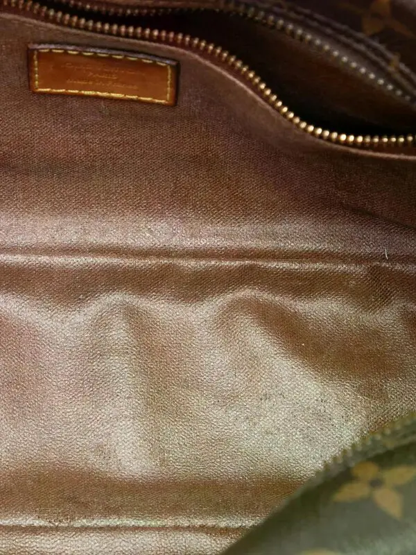 LOUIS VUITTON 2013 Monogram Trousse Toilette 25 Pouch