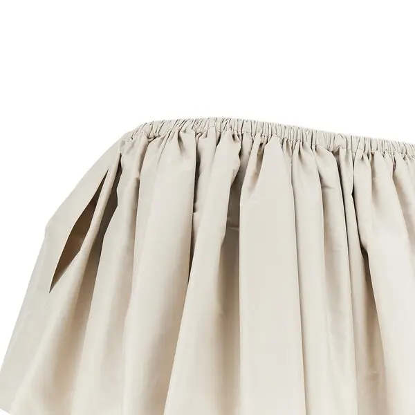 Miu Miu Mini Skirt With Logo Patch - Beige