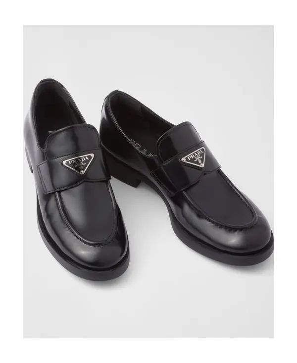 Prada Logo Plaque Almond-toe Loafers