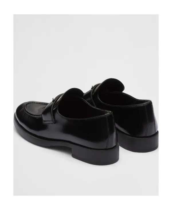 Prada Logo Plaque Almond-toe Loafers