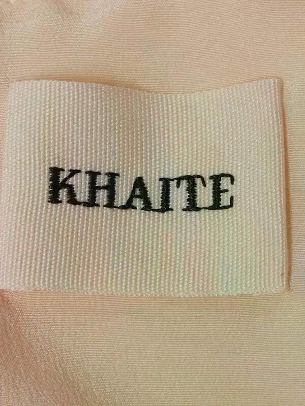 Khaite Sasmo Paneled Sleeveless Blouse