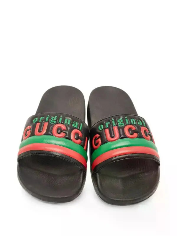 Gucci Embossed Logo Leather Slides