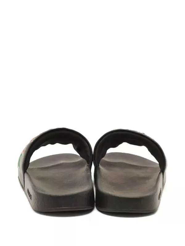 Gucci Embossed Logo Leather Slides