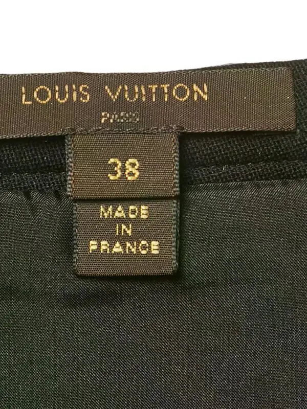 LOUIS VUITTON Wool Wrap Mini Skirt With Sculptural Button Detail
