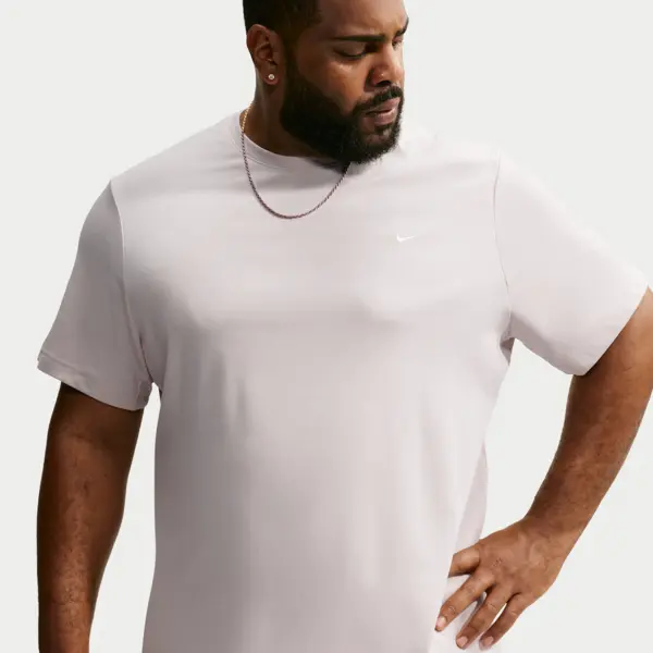 Nike Dri-fit Primary Short-sleeve Versatile Top - Brown