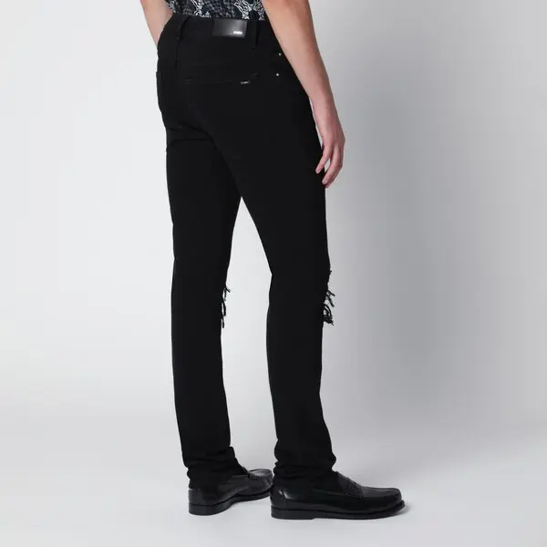 Amiri Skinny Ripped Cotton Jeans