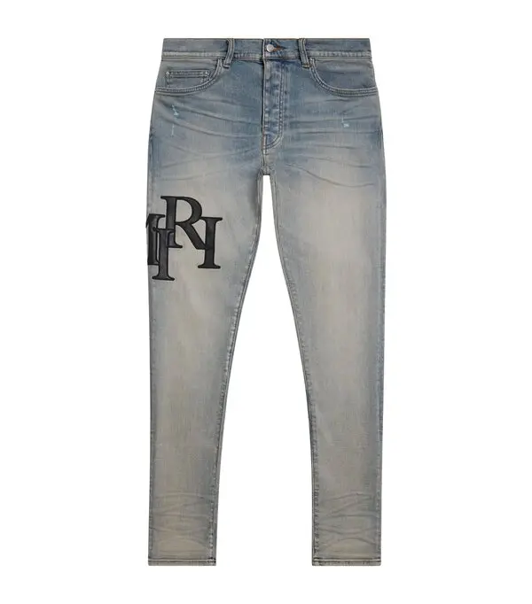 Amiri Staggered Logo Skinny Jeans