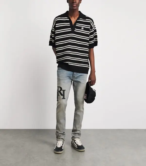 Amiri Staggered Logo Skinny Jeans