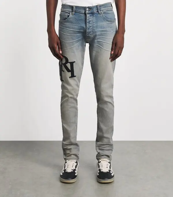 Amiri Staggered Logo Skinny Jeans