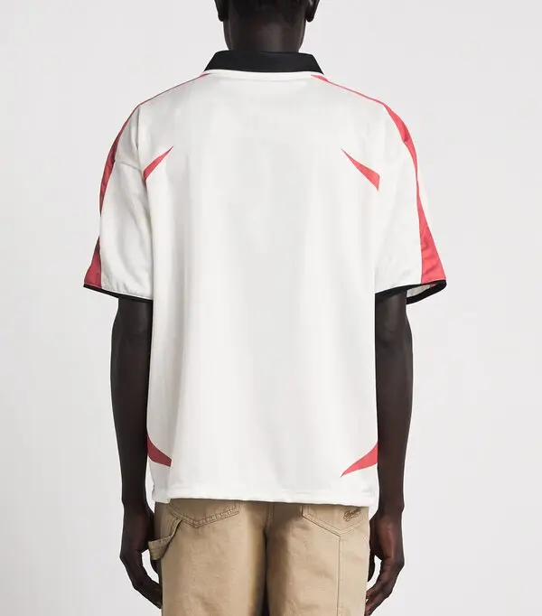REPRESENT Spike Football Top
