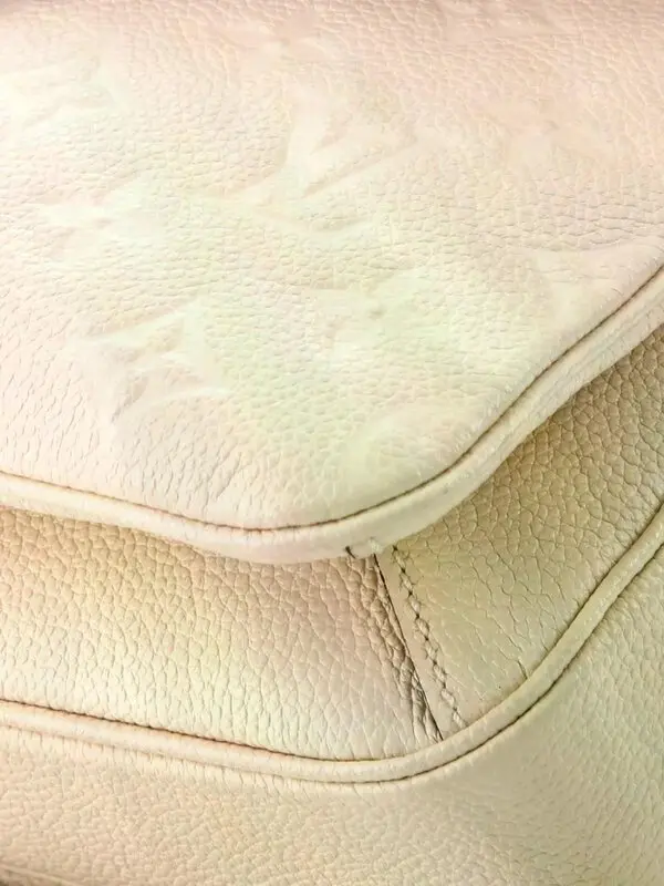 LOUIS VUITTON Braided Handle Pochette Métis Monogram Empreinte Leather Crossbody Bag