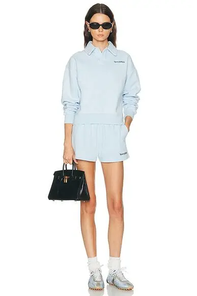 SPORTY & RICH Serif Logo Embroidered Polo Sweatshirt