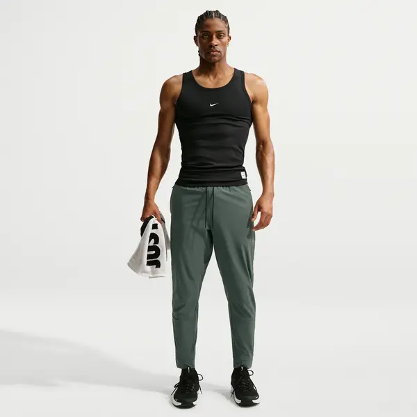 Nike Unlimited Dri-fit Zippered Cuff Versatile Pants - Green