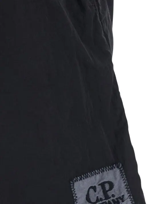C.P. COMPANY Swim Trunks With A Logo Patch