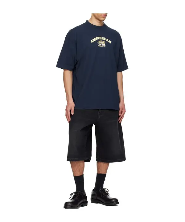 Vetements Faded Buttoned Denim Shorts