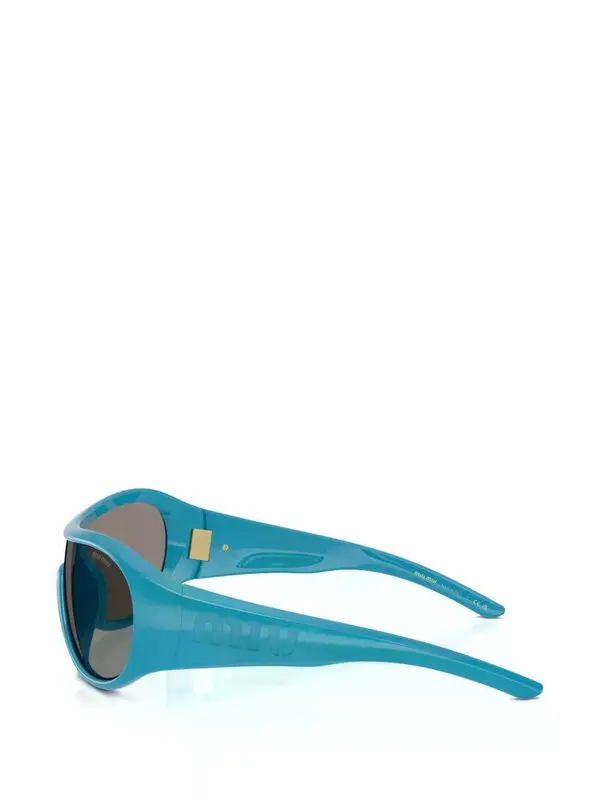 Miu Miu Oval Frame Sunglasses