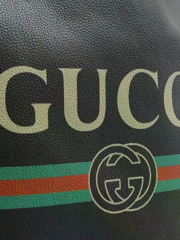 Gucci 2000-2015 Grained Calfskin Web Logo Drawstring Backpack