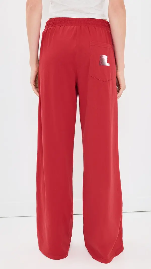 Lioness Red Eye Track Pants With Contrast Stripes