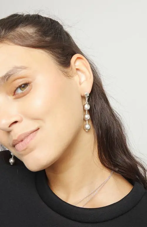 UNODE50 Long Ball Earrings Plated In Sterling