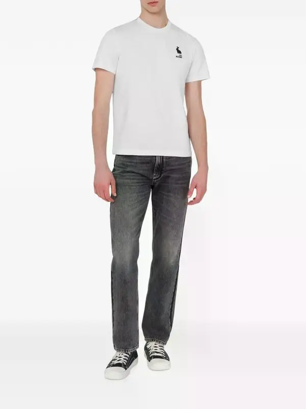 Moschino Faded-effect Logo-patch Jeans