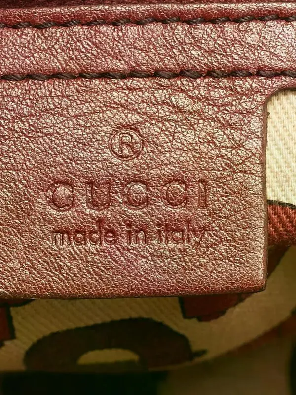 Gucci Guccissima Dome Bag With Crest Plaque