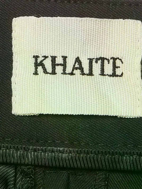Khaite Wide-leg Pleated Trousers