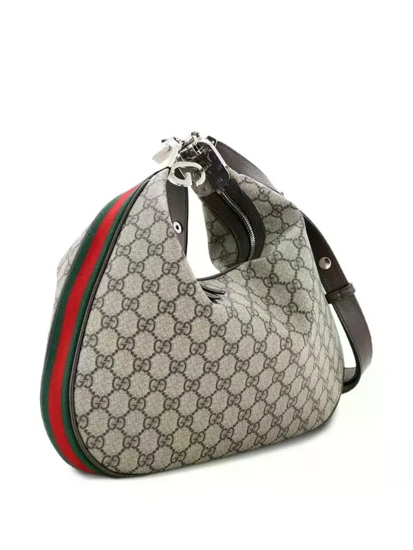 Gucci Gg Coated Canvas Medium Hobo Bag - Brown