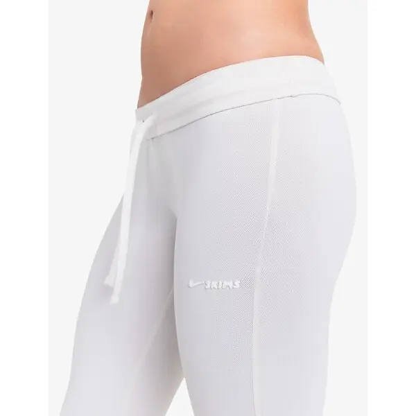 NIKESKIMS Skims Airy Low-rise Mini Flare Jersey Trousers - Ivory