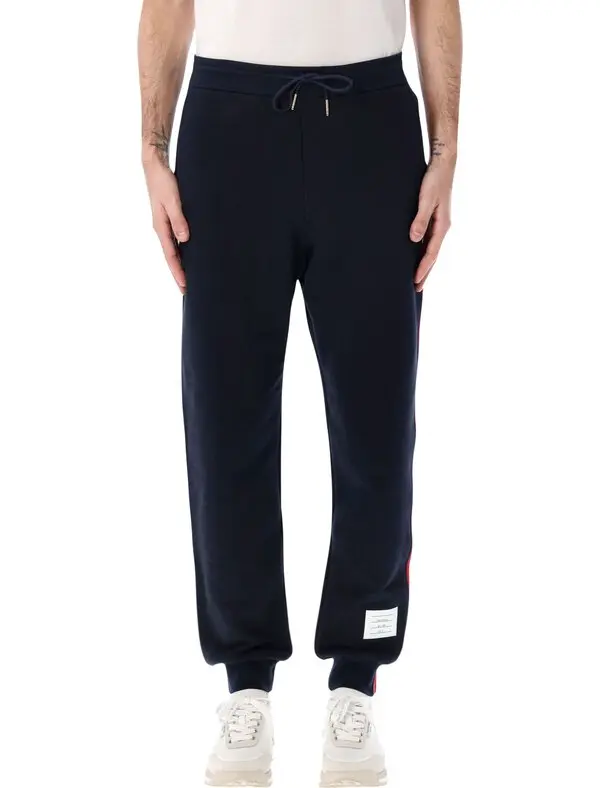 Thom Browne Grosgrain-trim Drawstring Sweatpants With Tricolor Side Stripe And Ankle Logo Patch - Blu