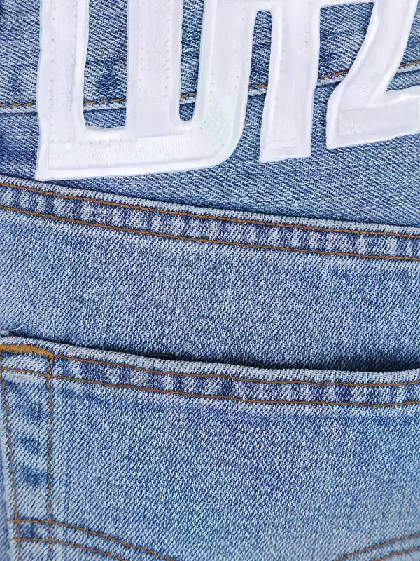 LUTZ HUELLE Asymmetric-hem Regular-fit Jeans