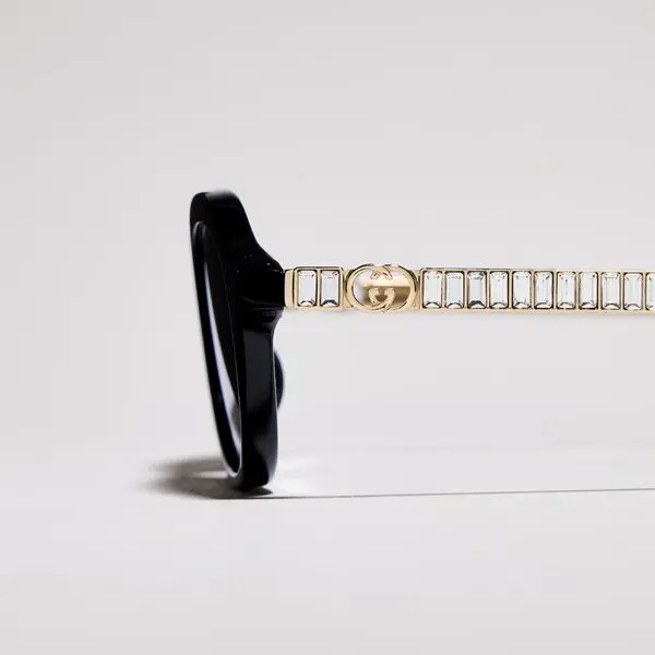 Gucci Oval Frame Sunglasses With Crystal Embellishments