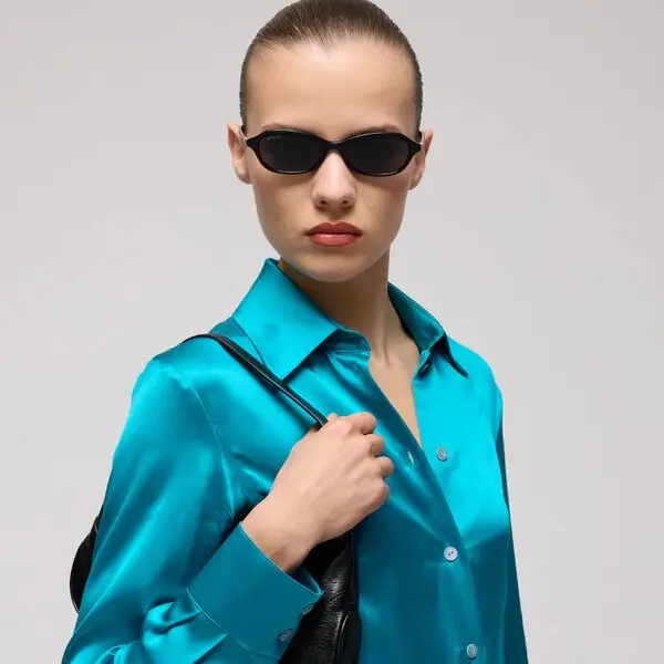 Gucci Oval Frame Sunglasses With Crystal Embellishments