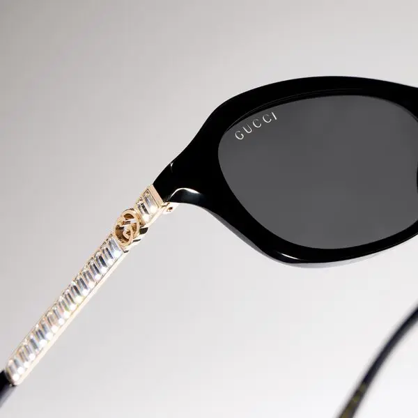 Gucci Oval Frame Sunglasses With Crystal Embellishments
