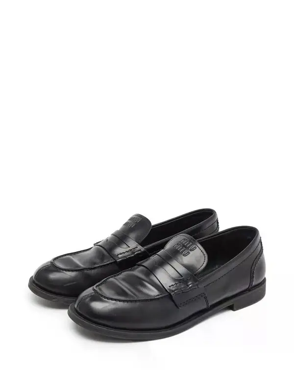 Miu Miu Embossed Logo Leather Loafers