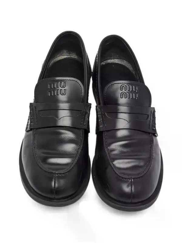 Miu Miu Embossed Logo Leather Loafers