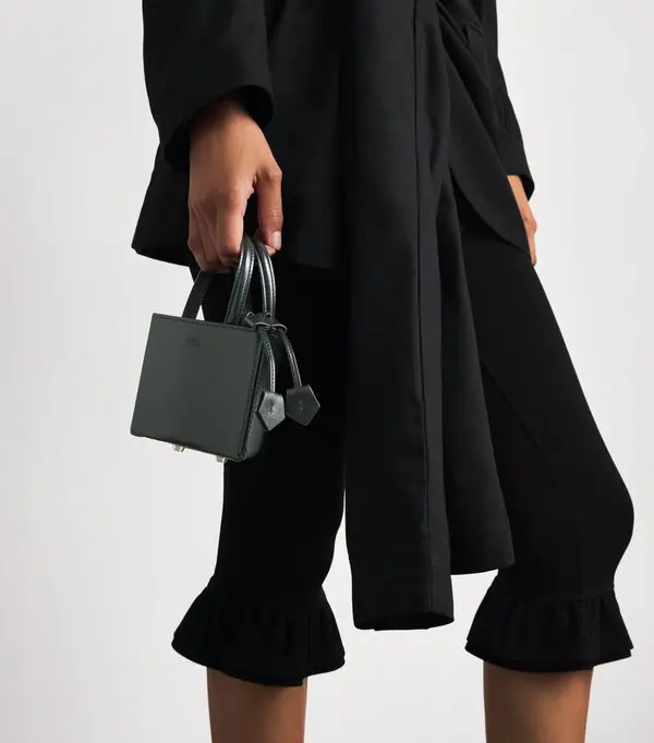 TALEL PARIS Leather Triangle Top Handle Bag
