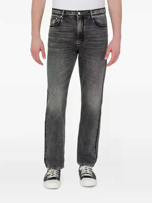 Moschino Faded Effect Logo Patch Jeans