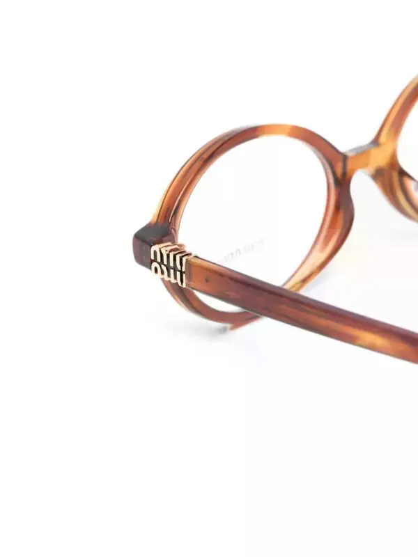 Miu Miu Oval Frame Glasses