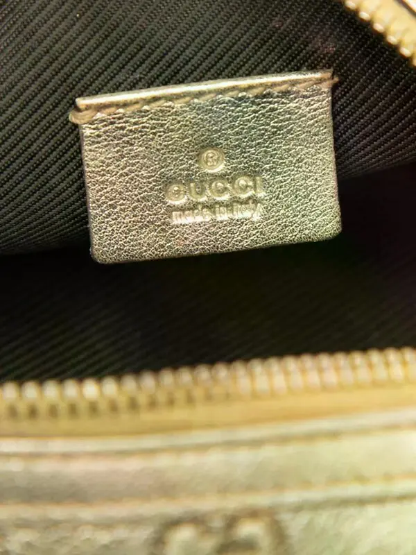 Gucci Metallic Gg Embossed Cosmetic Pouch