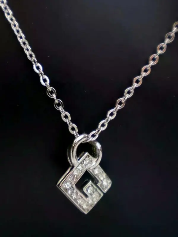 Givenchy Tone G Logo Rhinestone Pendant Necklace - Silver