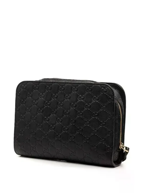 Gucci Embossed Leather Clutch Bag