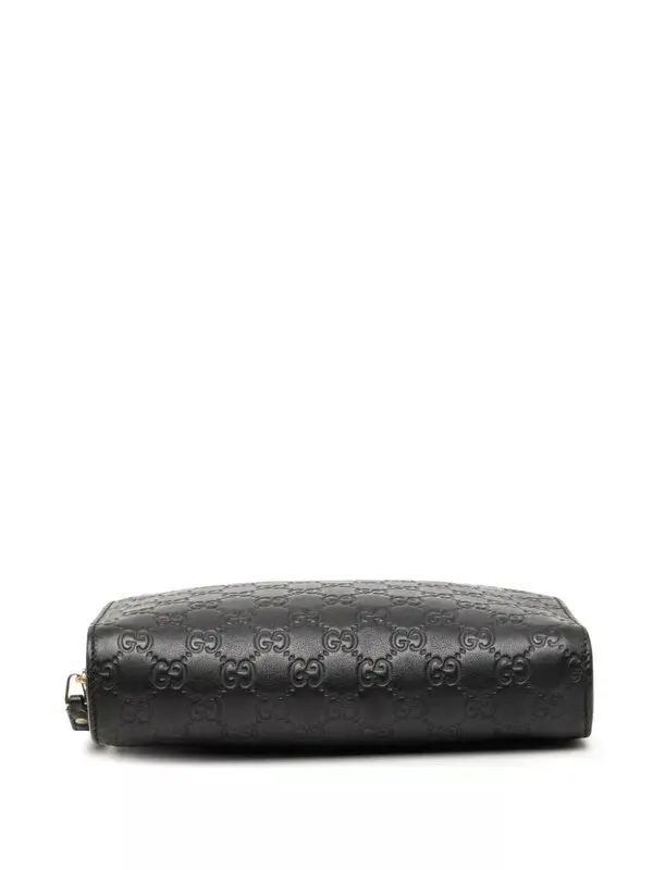 Gucci Embossed Leather Clutch Bag