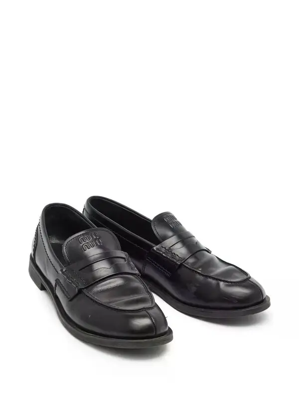 Miu Miu Embossed Logo Leather Loafers