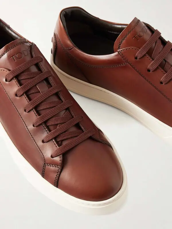 TOD'S Cassetta Rubber-trimmed Glossed-leather Sneakers