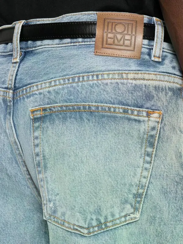 TOTEME Light Washed Denim Board Shorts