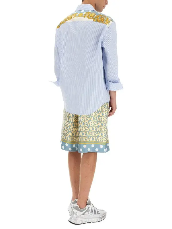 Versace Shorts With All-over Logo Print - Multicolor